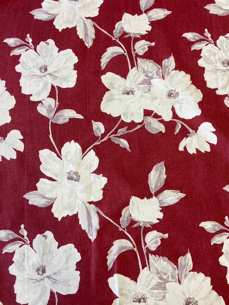 Refined and exclusive double-height floral fabric with red background ...