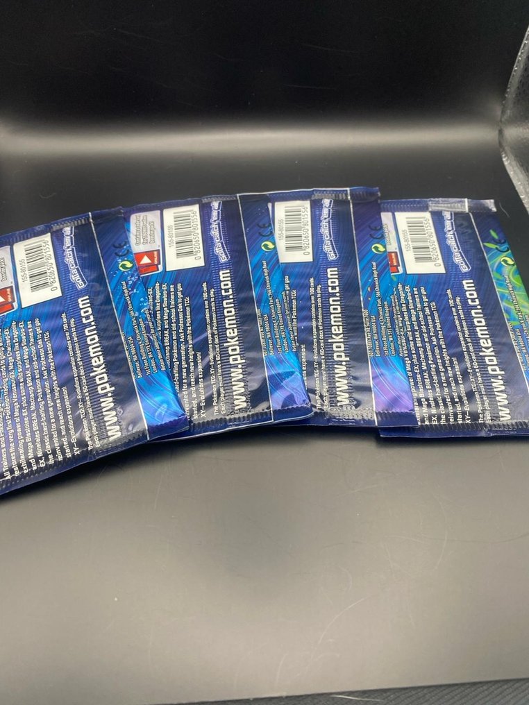 Pokémon - 4 Booster pack - xy evolution original - Catawiki