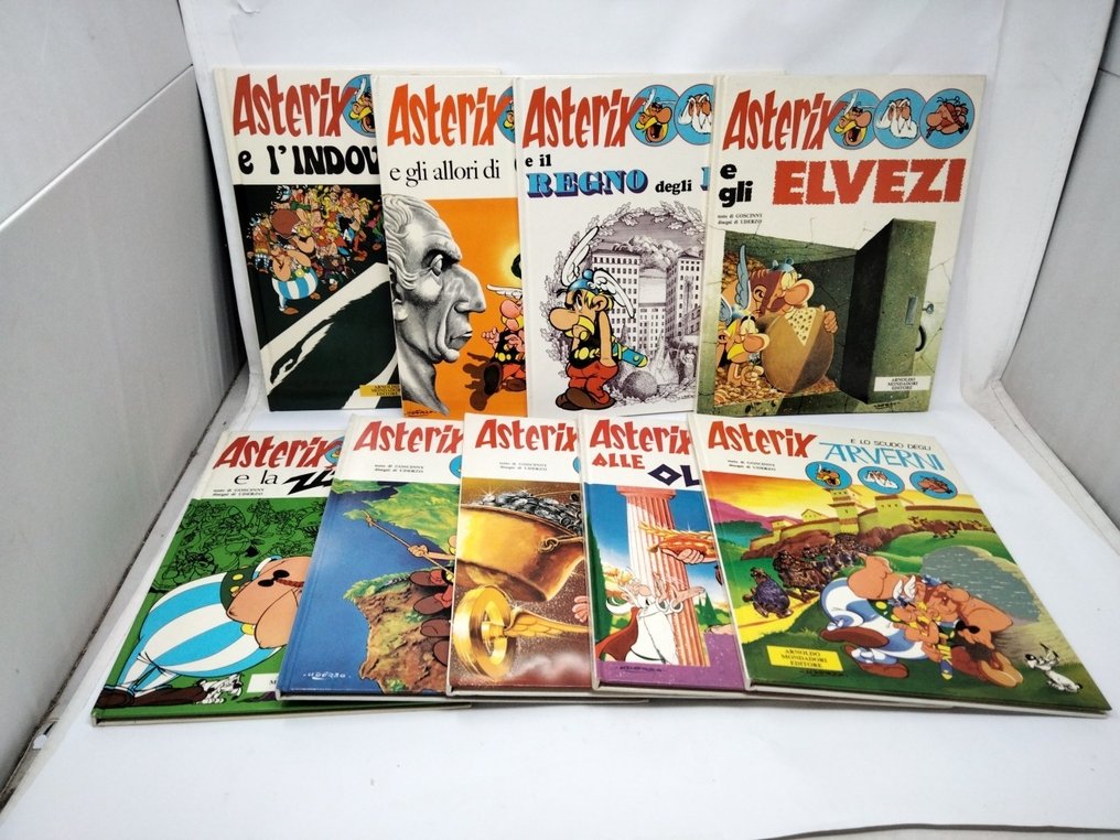 Asterix, Oumpah-Pah Collezione volumi cartonati + stickers + manifesto ...