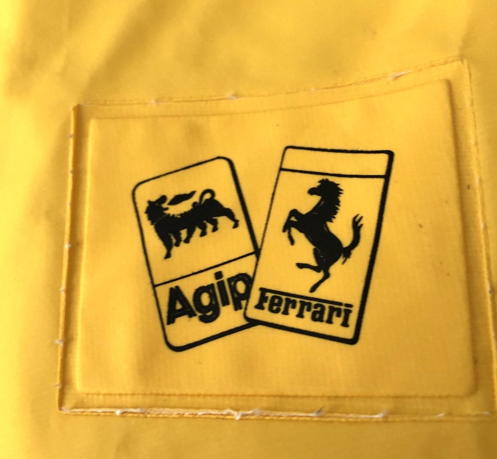 Clothing - Ferrari - Ferrari / Agip Vintage Paddock Poncho - Catawiki