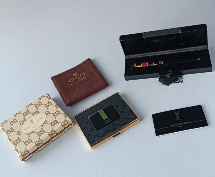 Gucci, Yves Saint Laurent - Fume-cigare (2) - Laiton - Catawiki