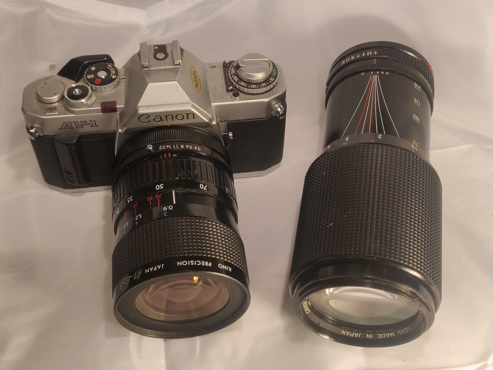 Canon AV-1 + FD 4/70–210mm + Kino Precision 35–70mm Macro zoom Analoge ...