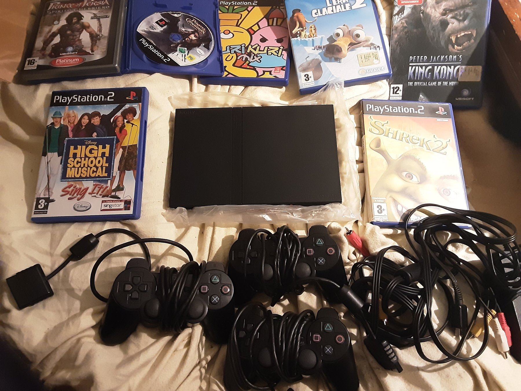 1 Sony Ps2 slim - Console with games (9) - Catawiki