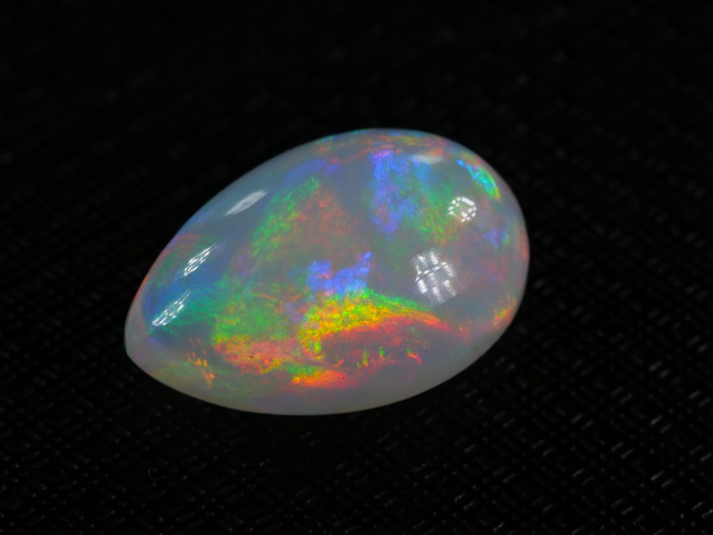 Geen reserve wit + kleurenspel (levendig) Opaal - 6.18 ct - Catawiki Geen reserve wit + kleurenspel (levendig) Opaal - 6.18 ct - Catawiki