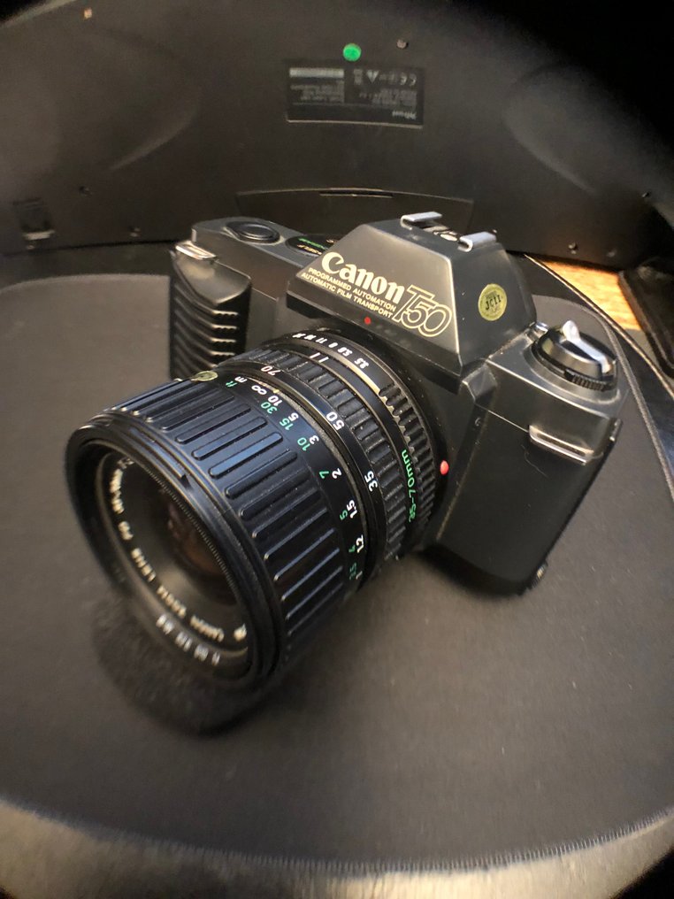 Canon T50 + FD 3.5-4.5/35-70mm Appareil photo argentique - Catawiki
