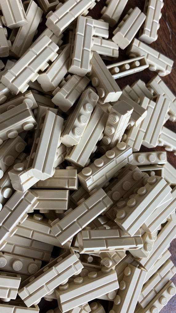 LEGO - Tiles - 100 stuks Tan Brick, Modified 1 x 4 with - Catawiki