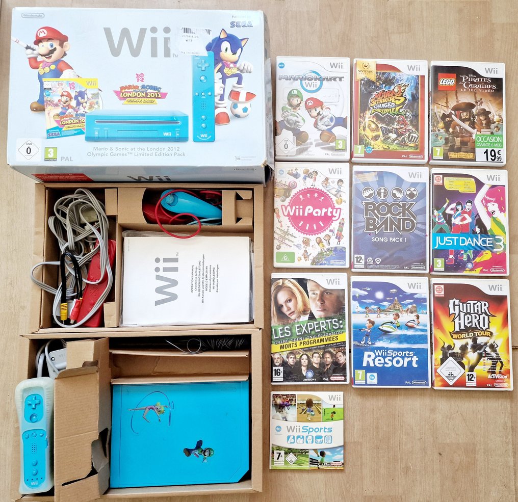 Nintendo Wii limited edition + 10 videogames + box + - Catawiki