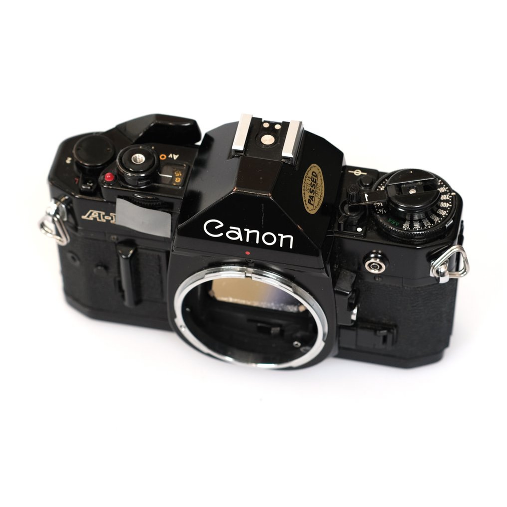 Canon A1 Body + AE-1 Body Single lens reflex camera (SLR) - Catawiki