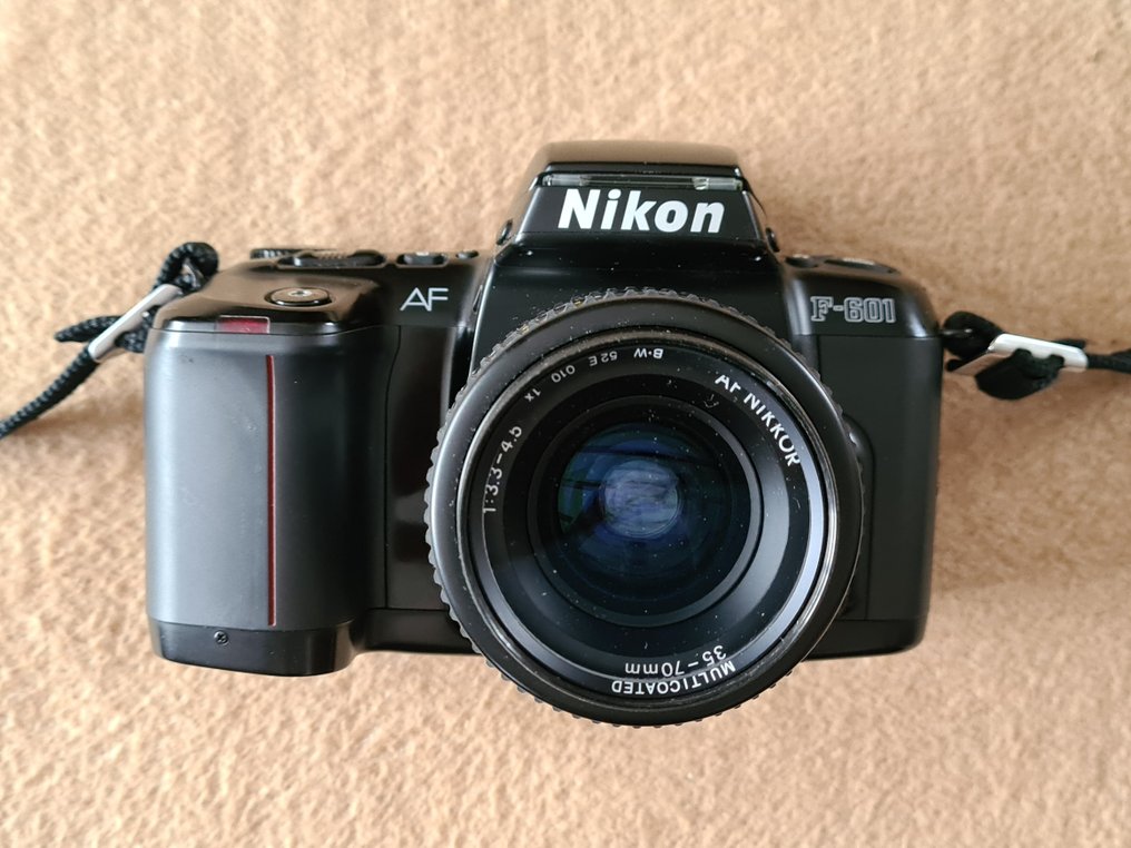Nikon F601 + AF Nikkor 35-70, AF Nikkor 70-210, Flash Speedlight SB-24 ...