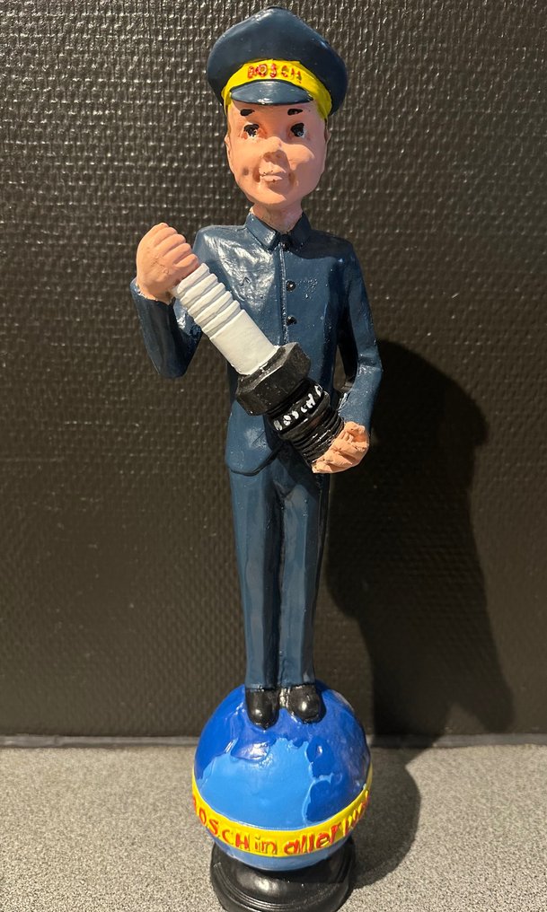 Advertising figures - Bosch - The Workman with spark plug and The ...