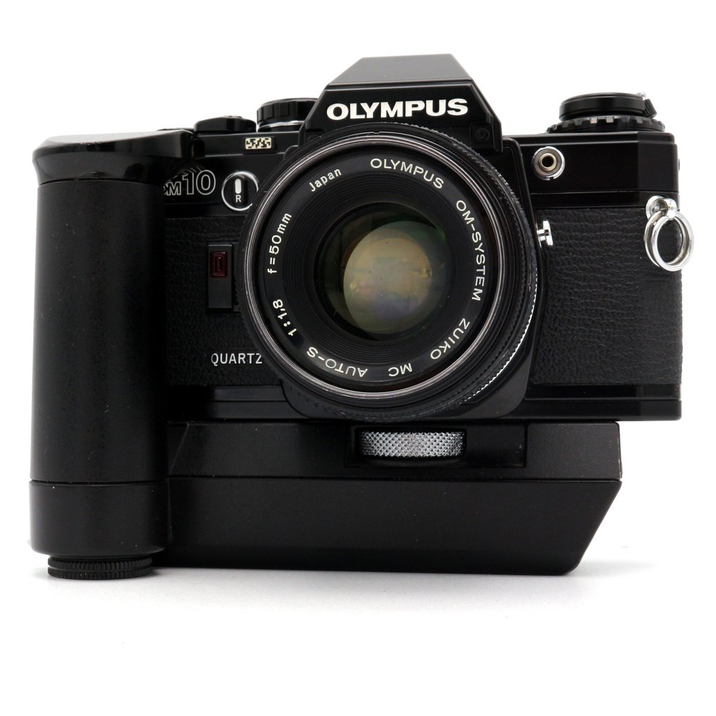 Olympus OM-10 Quartz zwart + MC Zuiko 50mm f/1.8 + OLYMPUS Winder 2 Single lens reflex camera ...